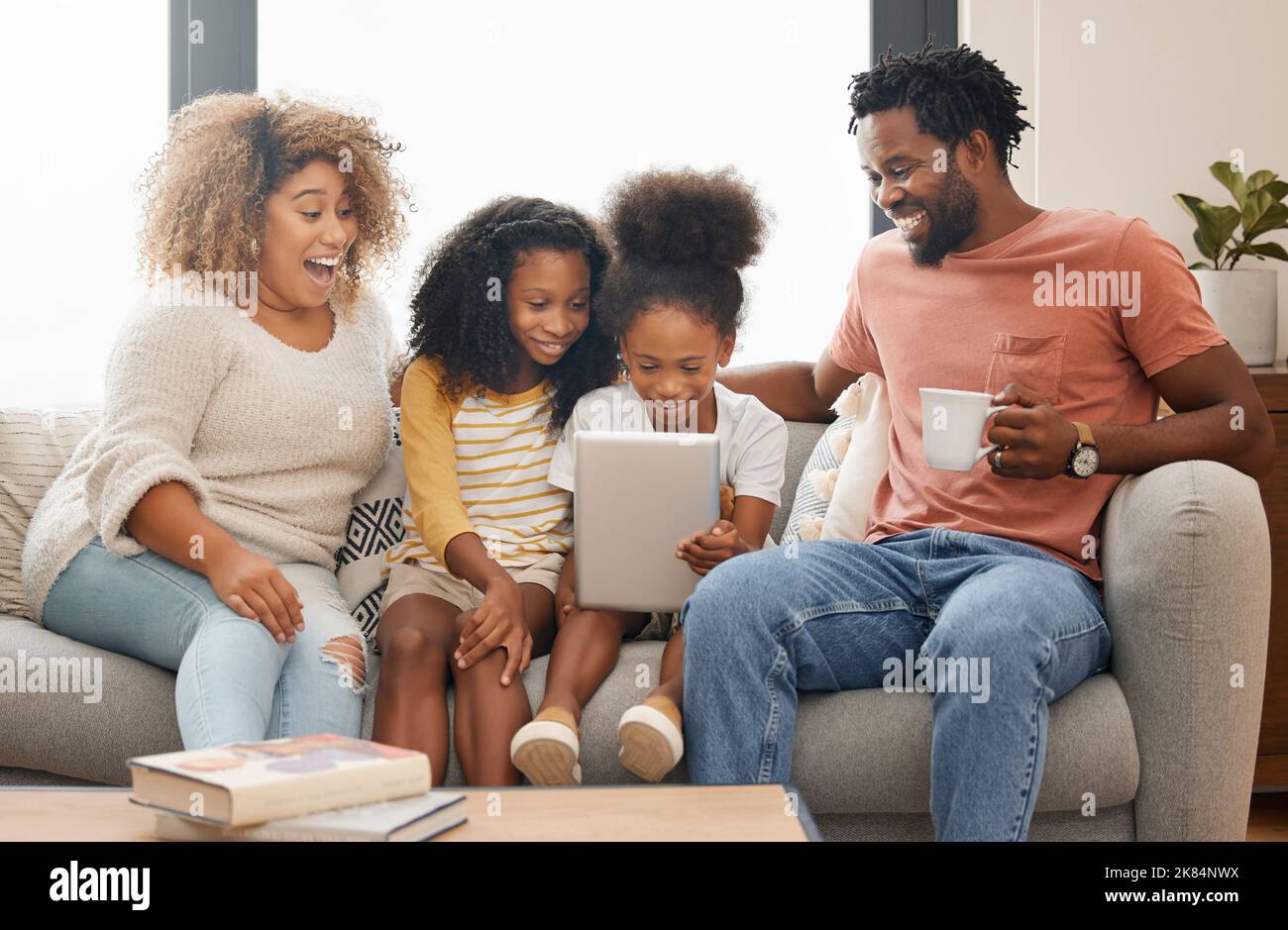 Were all homebodies in this family. a young family spending time ...