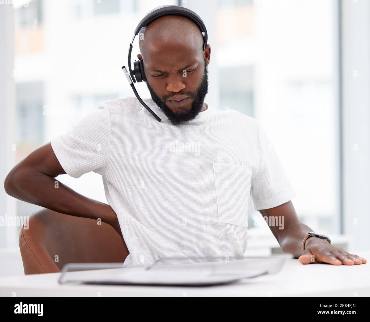 Oh boy that back cramp crept up on me. a young male call center worker ...