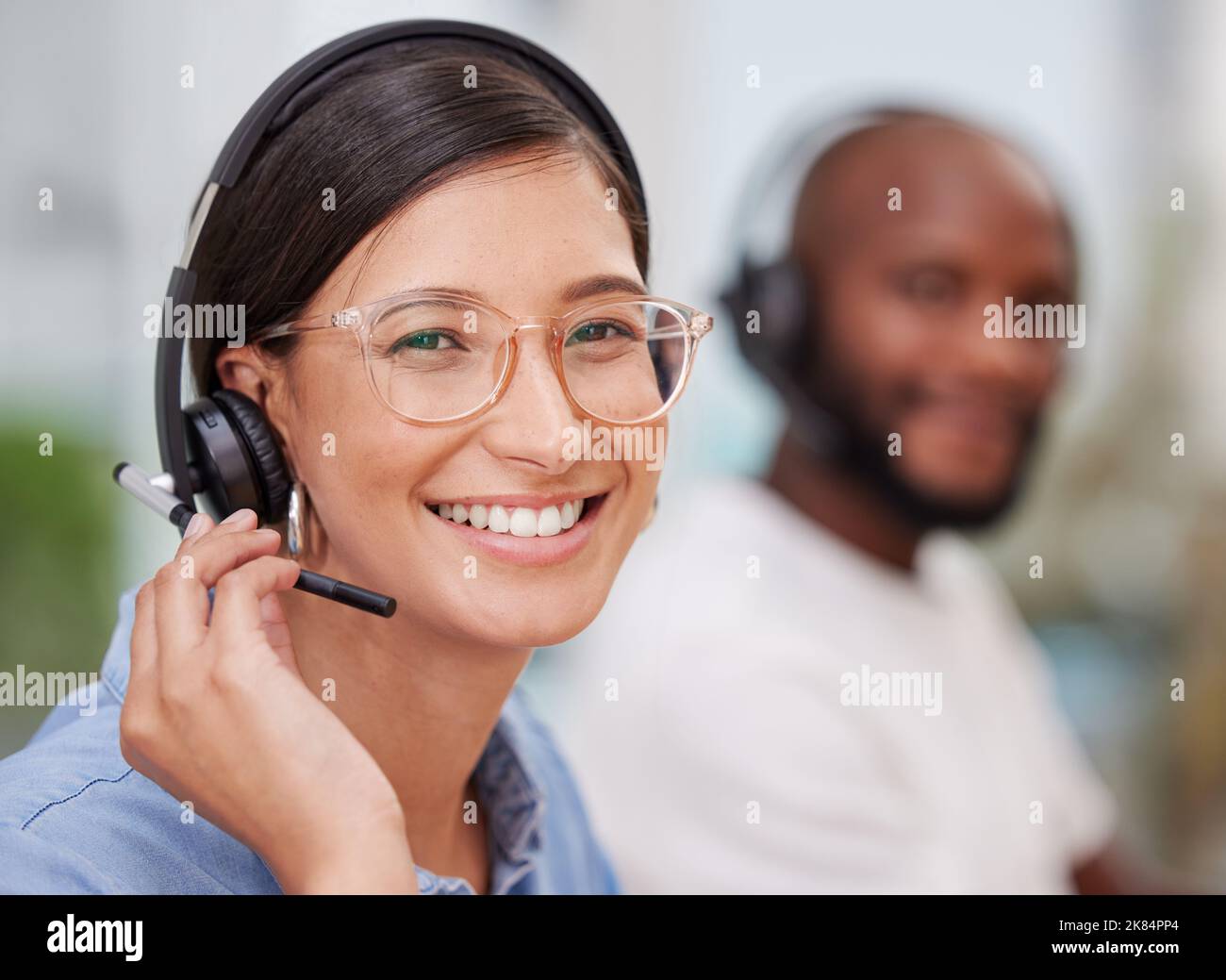 Were here to answer your call. two call center workers together Stock ...