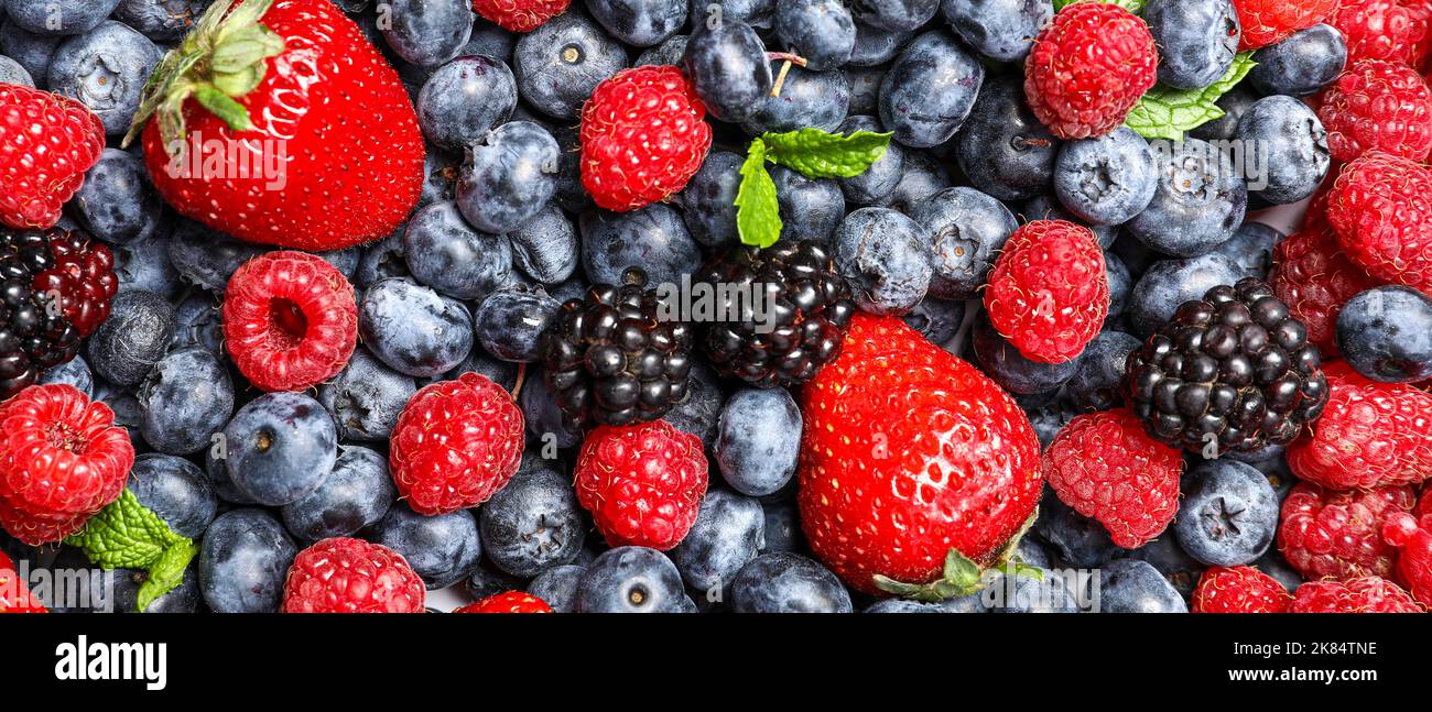 Different fresh berries as background, top view Stock Photo - Alamy