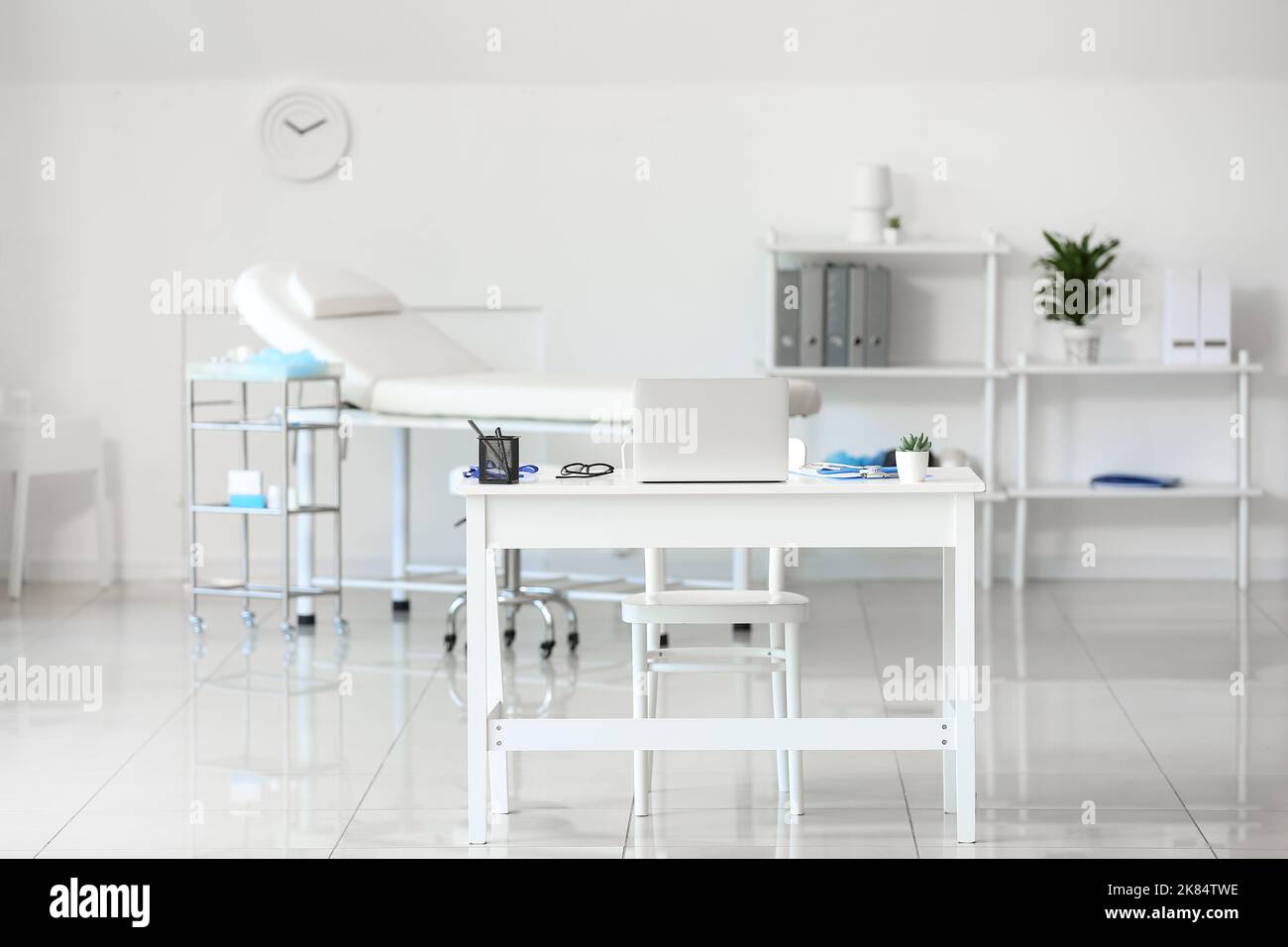 Interior of medical office with doctor's workplace and couch Stock ...