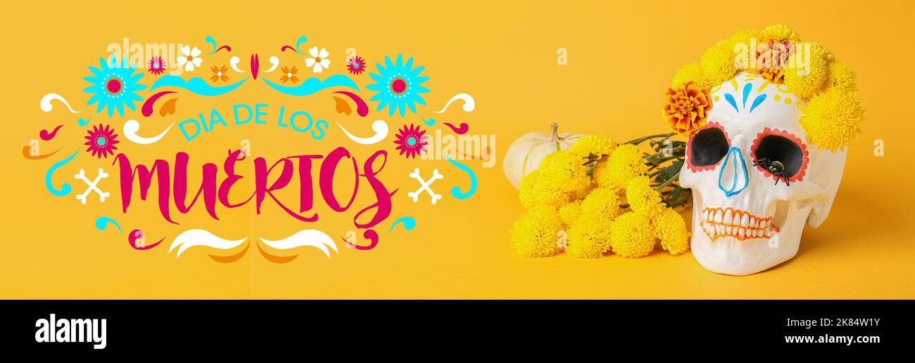 Painted human skull and flowers on yellow background. Mexico's Day of ...