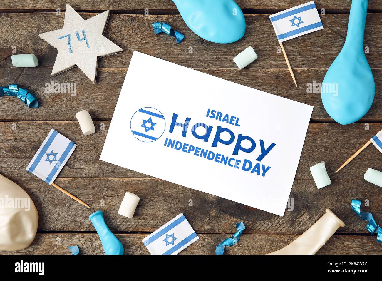 Card with text ISRAEL HAPPY INDEPENDENCE DAY, flags and star of David ...
