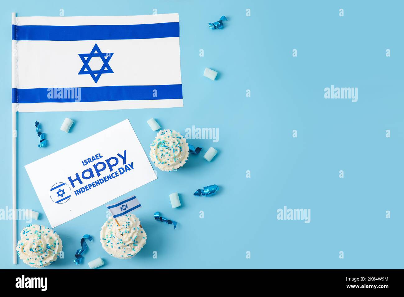 Flag of Israel, cupcakes and card with text HAPPY INDEPENDENCE DAY on ...