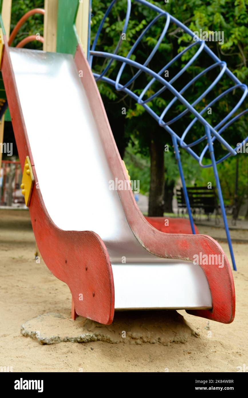 Slide on children's playground in city park Stock Photo - Alamy