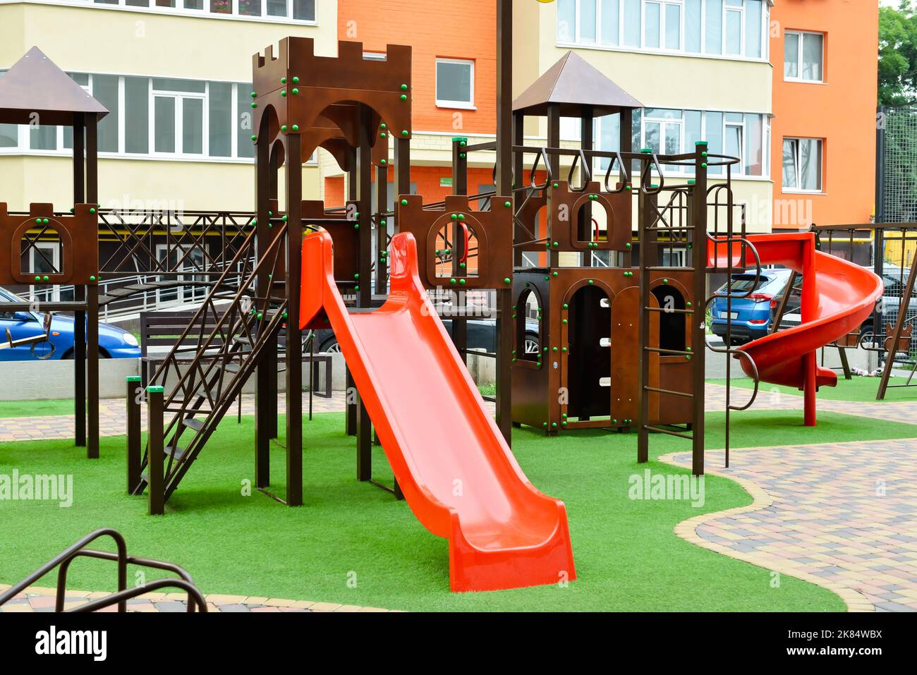 Modern children's playground with slide outdoors Stock Photo - Alamy