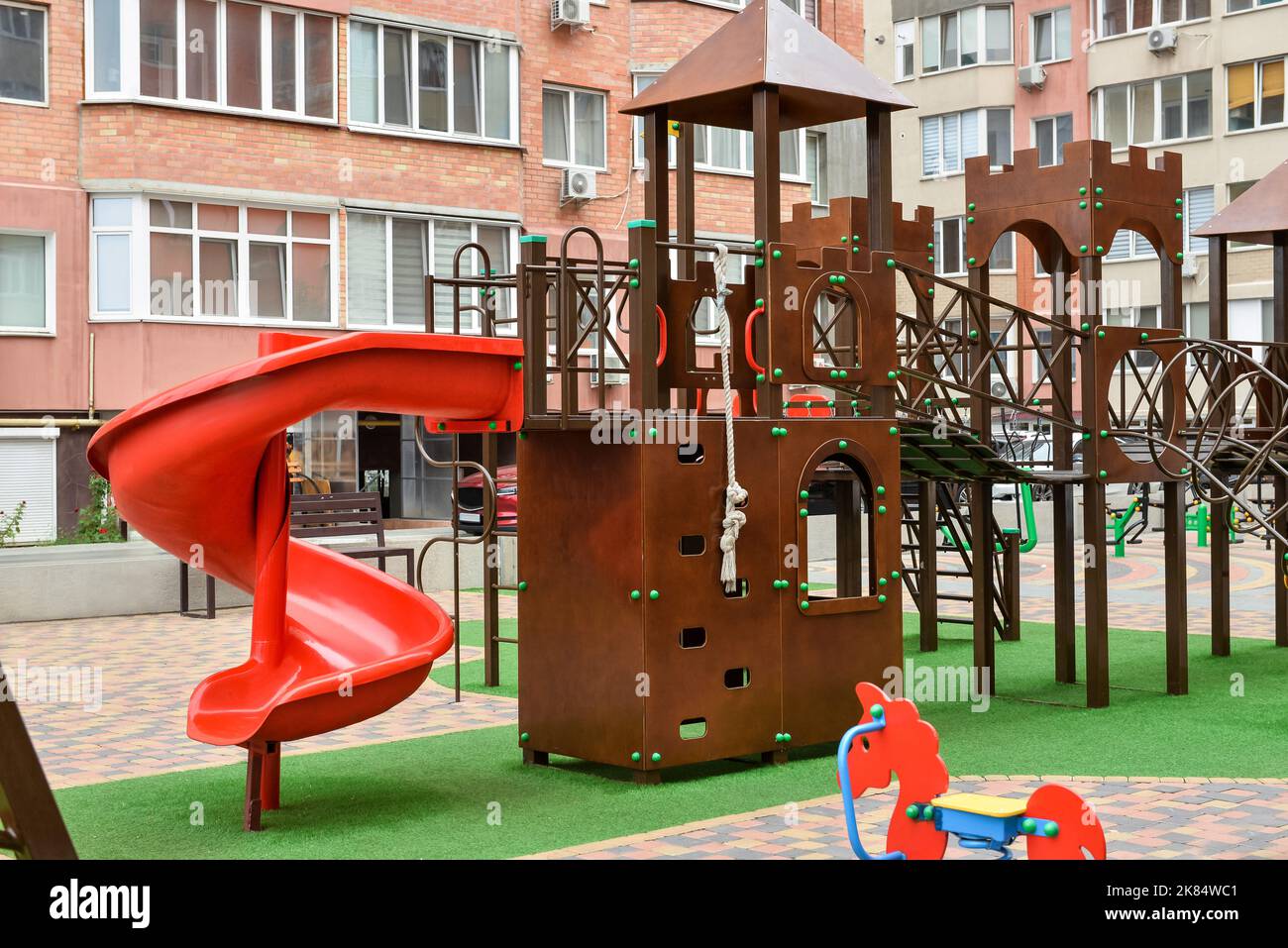 Modern children's playground in courtyard Stock Photo - Alamy