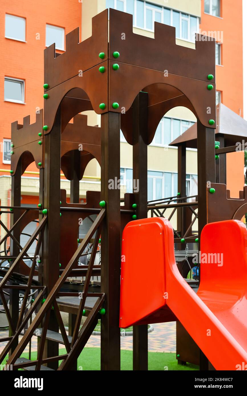 Modern slide on children's playground in city Stock Photo - Alamy