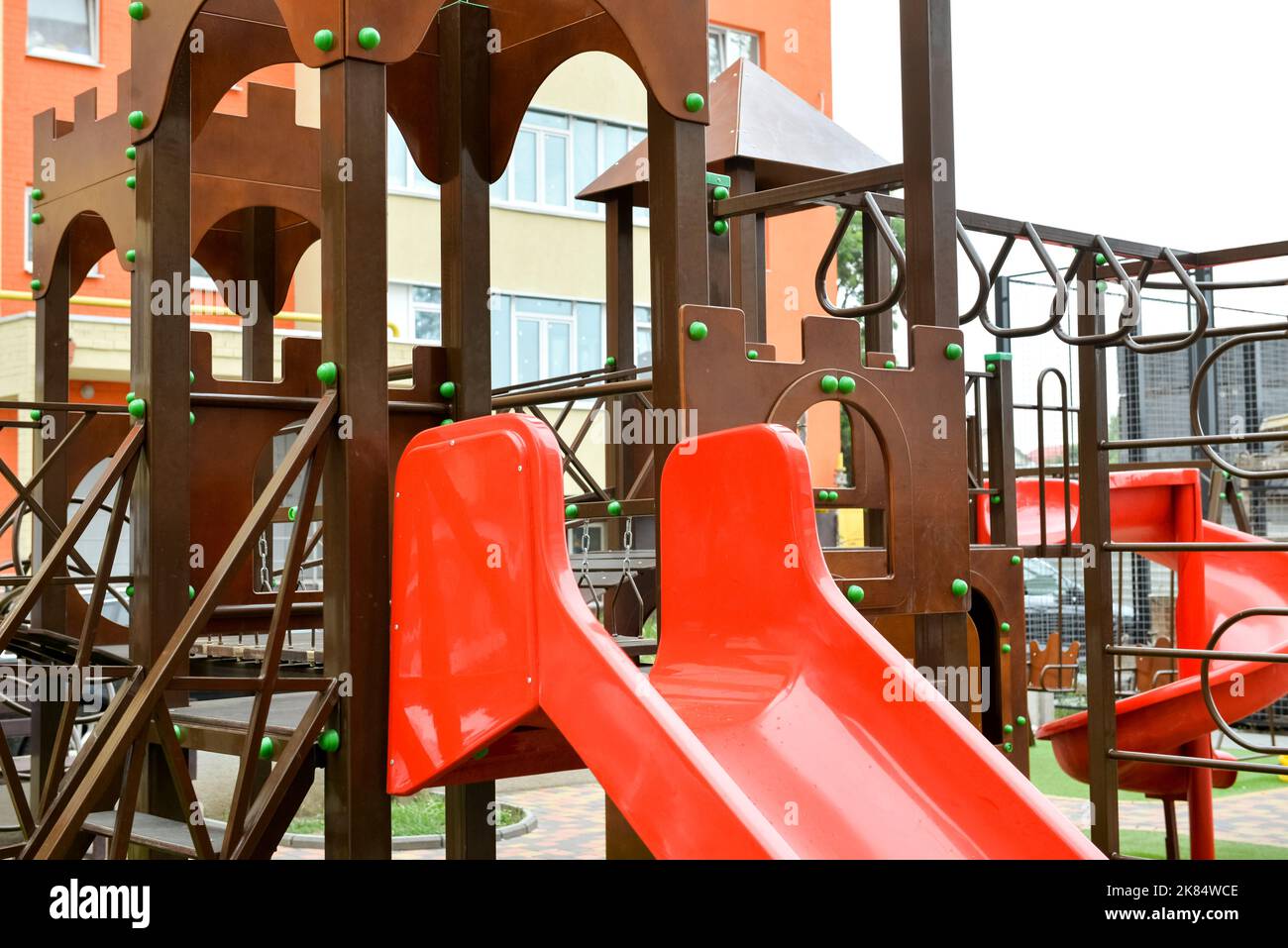 Modern slide on children's playground in city Stock Photo - Alamy