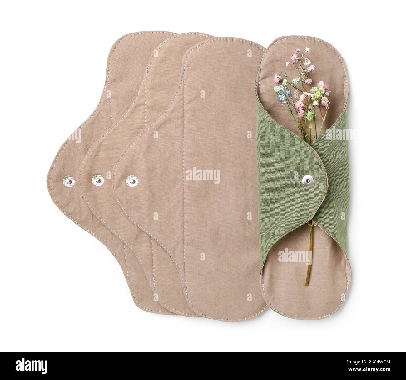 Reusable menstrual pads and flowers on white background Stock Photo - Alamy