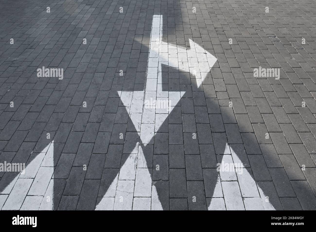 Direction mark on parking lot Stock Photo - Alamy