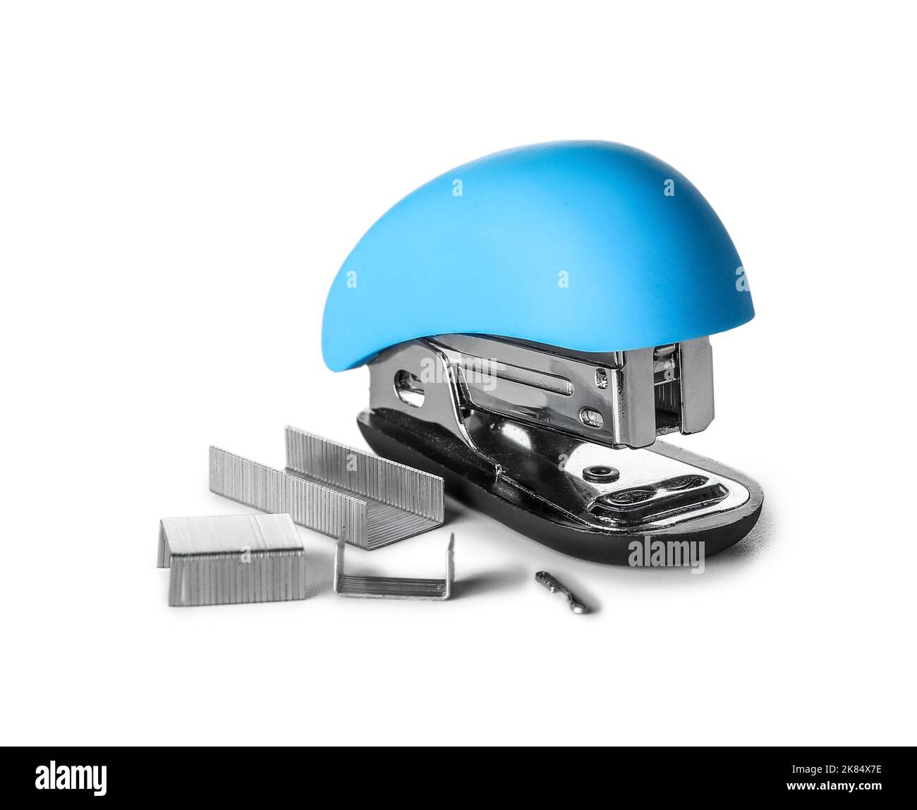 Modern blue stapler on white background Stock Photo - Alamy
