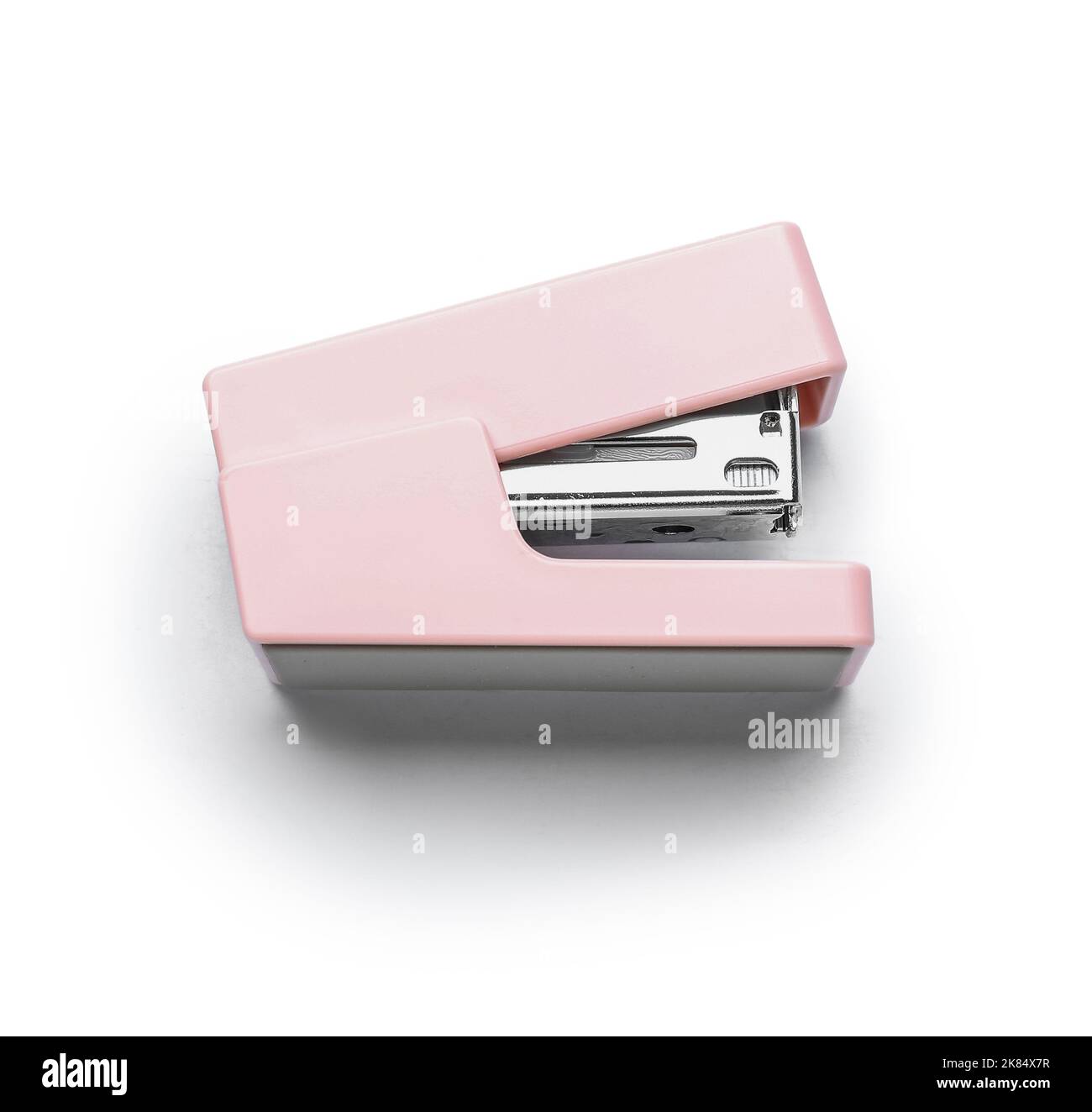 Pink stapler isolated on white background Stock Photo - Alamy