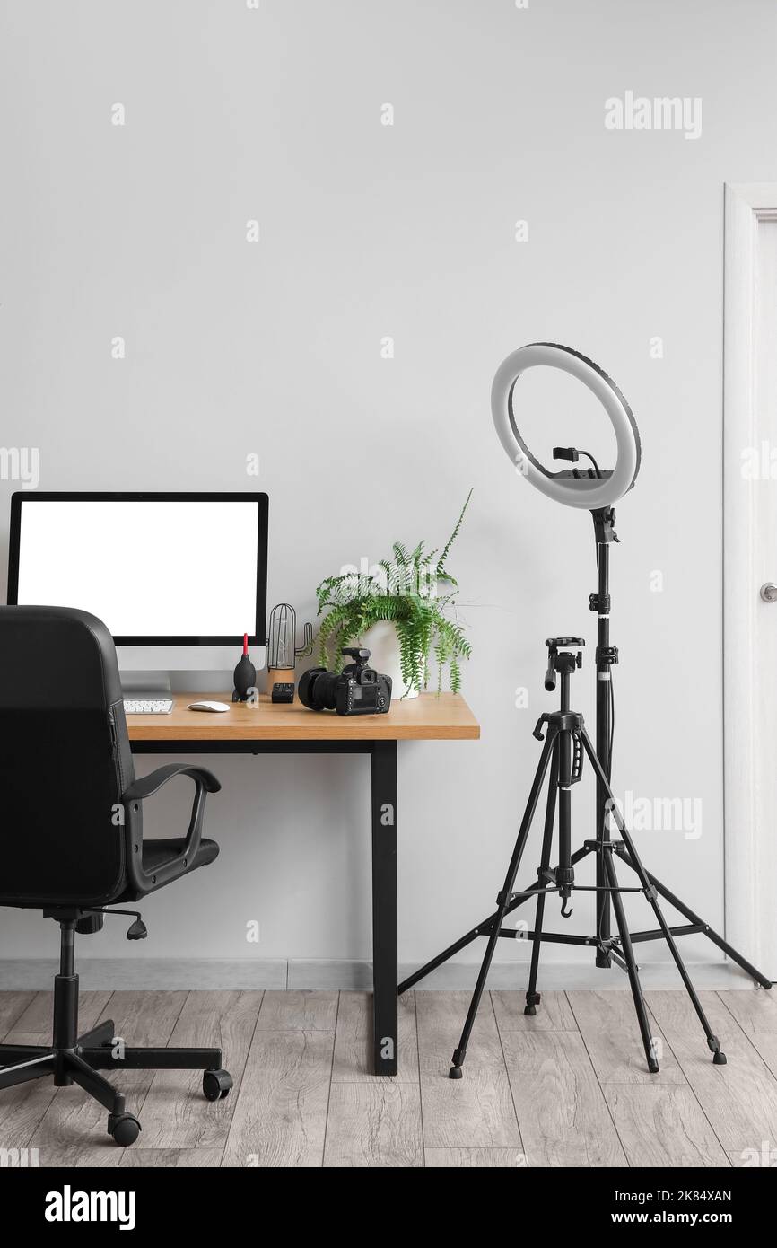 Interior of modern office with photographer's workplace and equipment ...