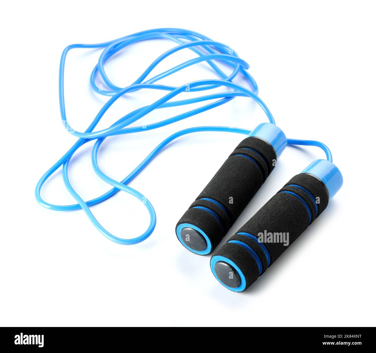 Blue skipping rope on white background Stock Photo - Alamy