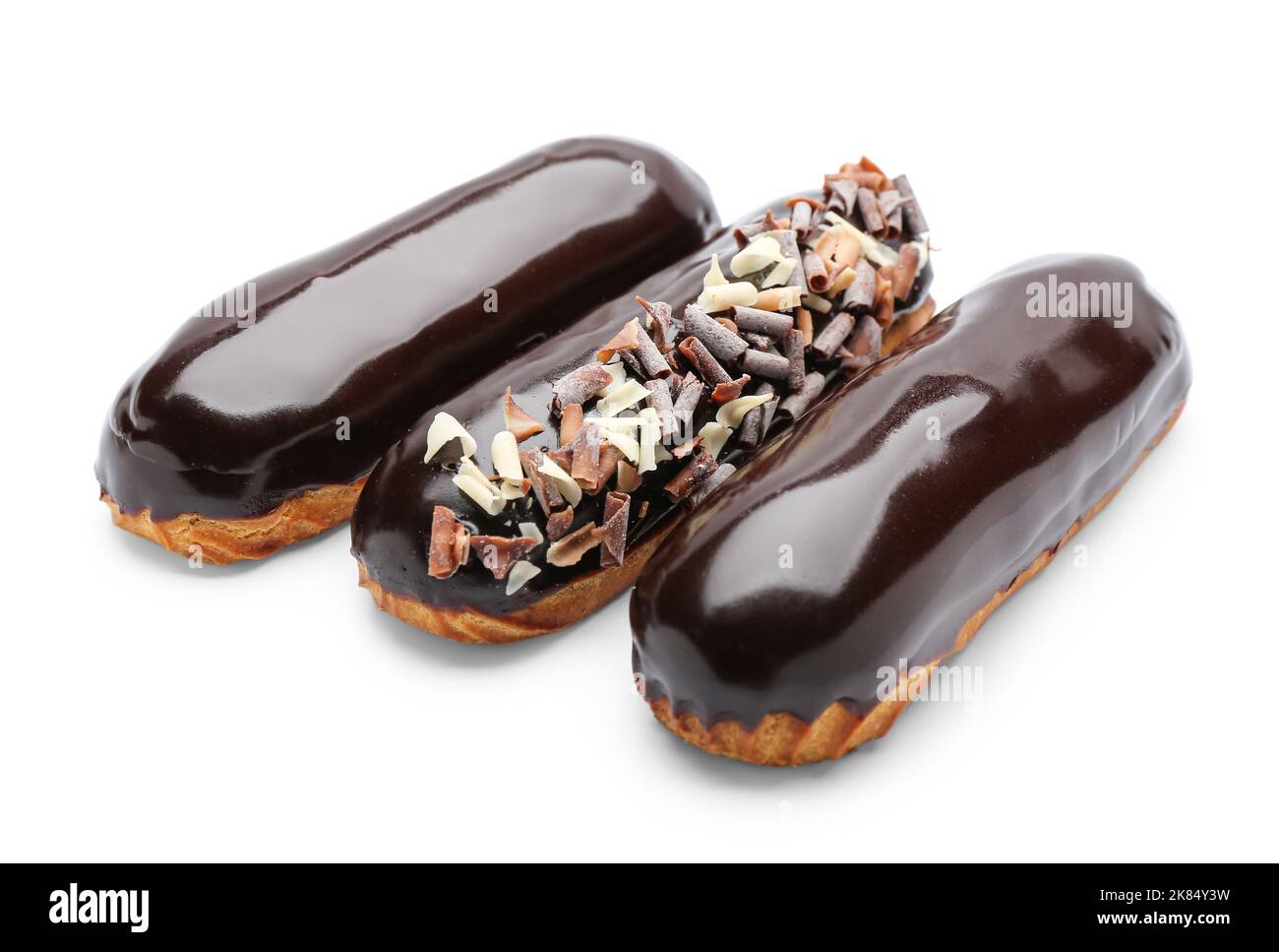 Delicious eclairs in chocolate glaze on white background Stock Photo ...