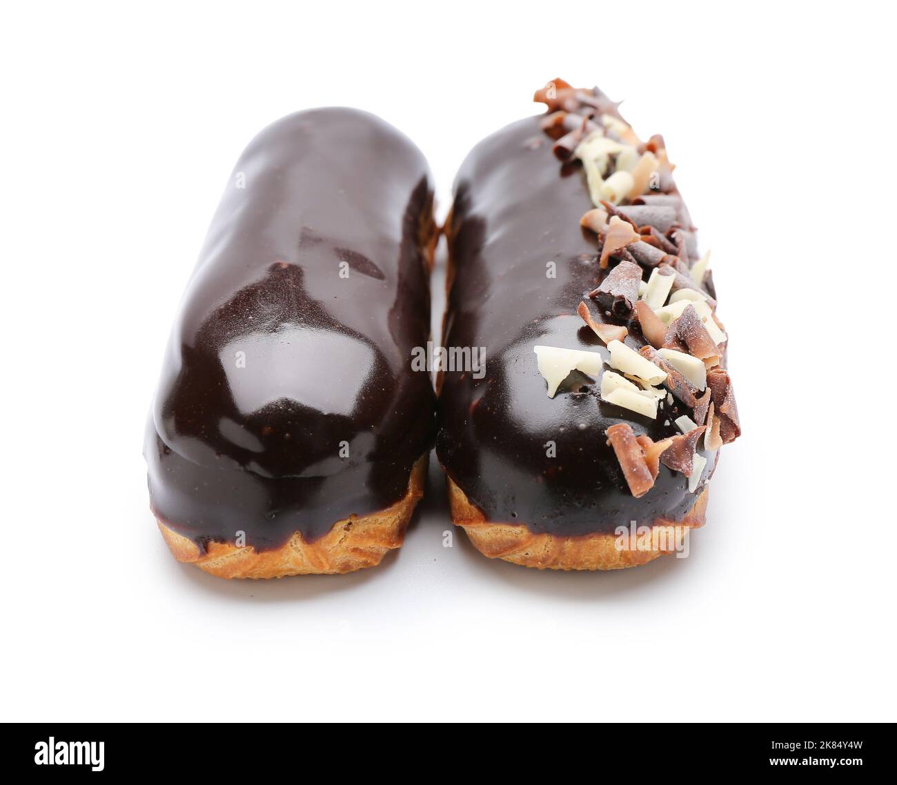 Delicious eclairs in chocolate glaze on white background Stock Photo ...