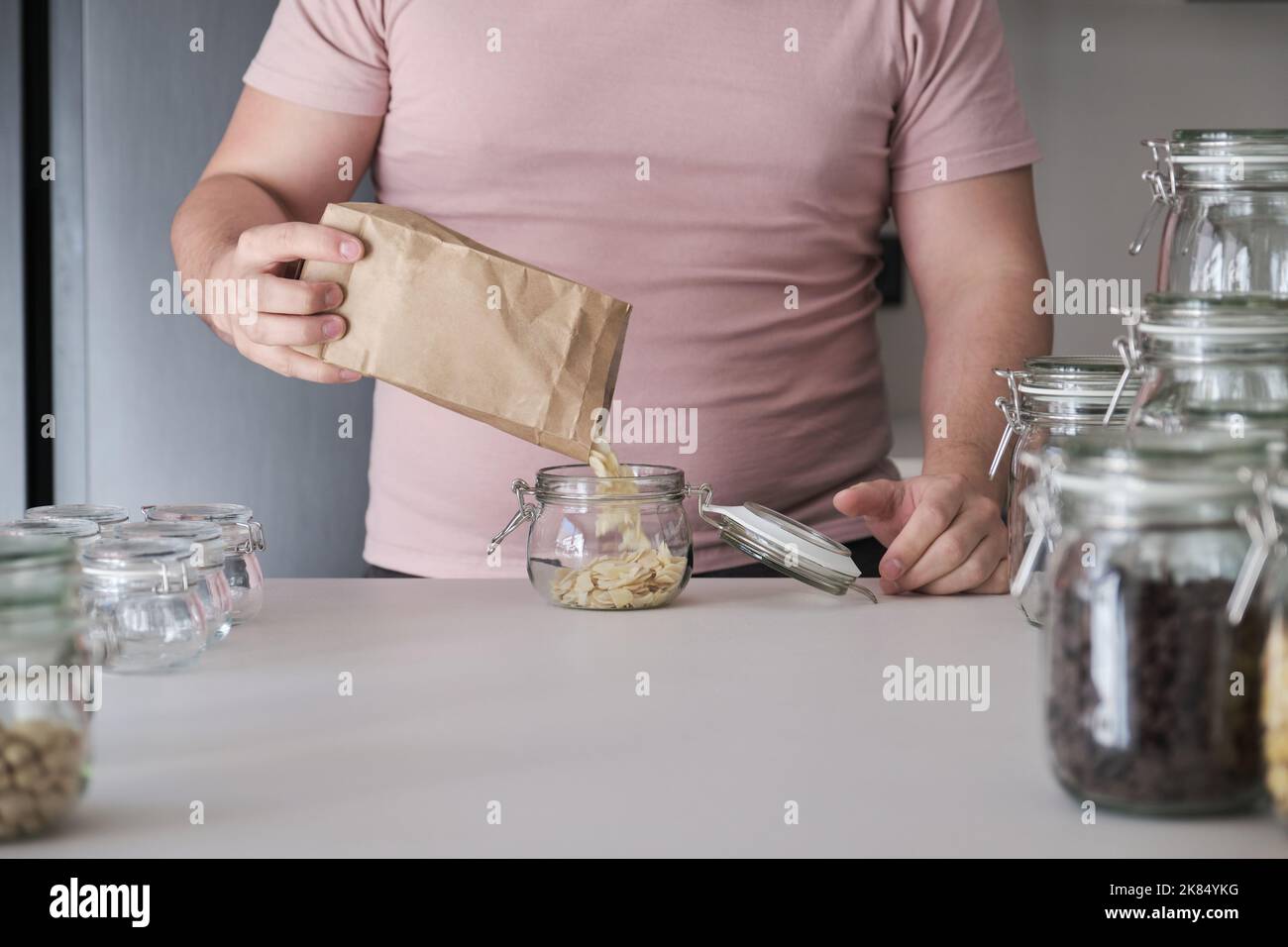 Man filling bag from store hi-res stock photography and images - Alamy