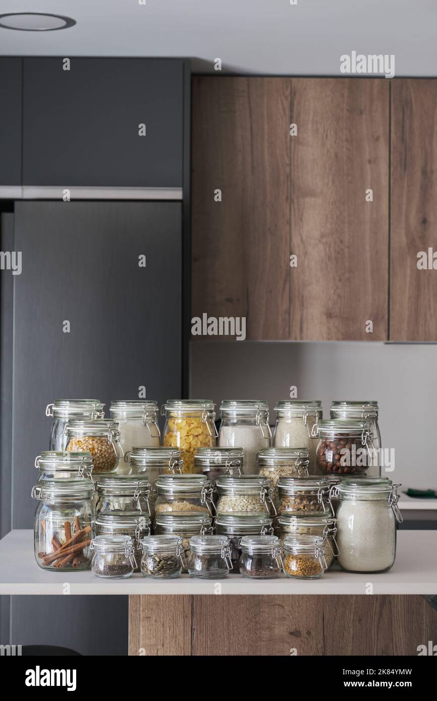 Variety of dry foods, grains, nuts, cereals in glass jars Stock Photo ...