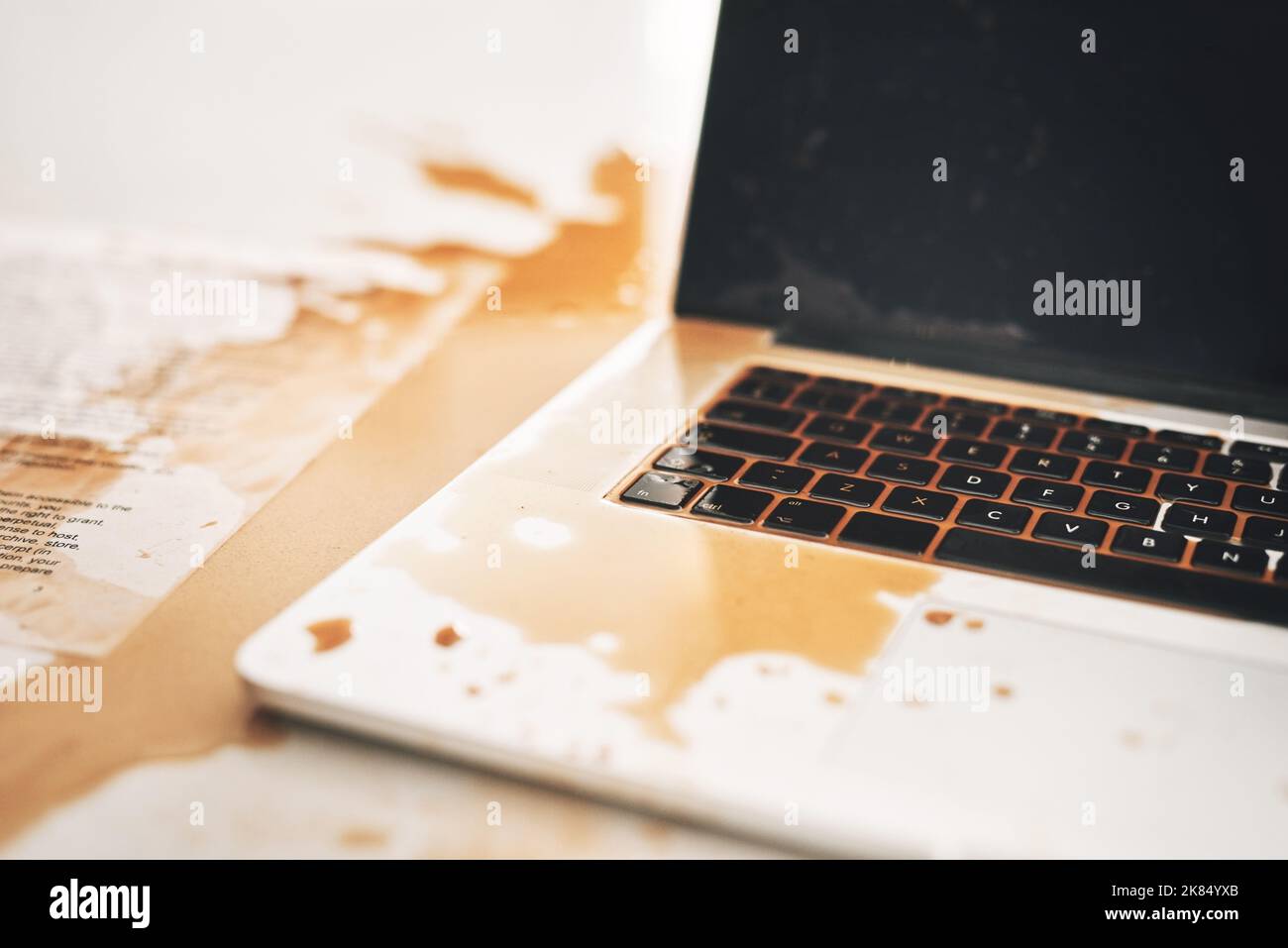 Spilt drink laptop hi-res stock photography and images - Alamy