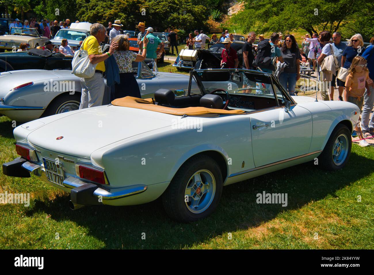 BADEN BADEN, GERMANY - JULY 2022: white Fiat 124 Sport Spider 1966, oldtimer meeting in Kurpark ...