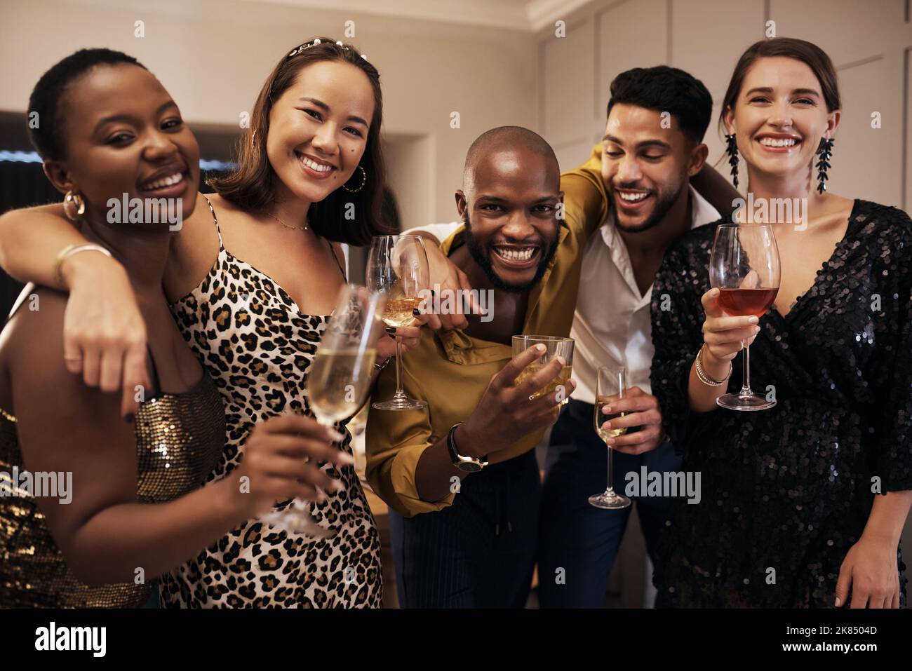 Were ready to start this party. a diverse group of friends standing ...