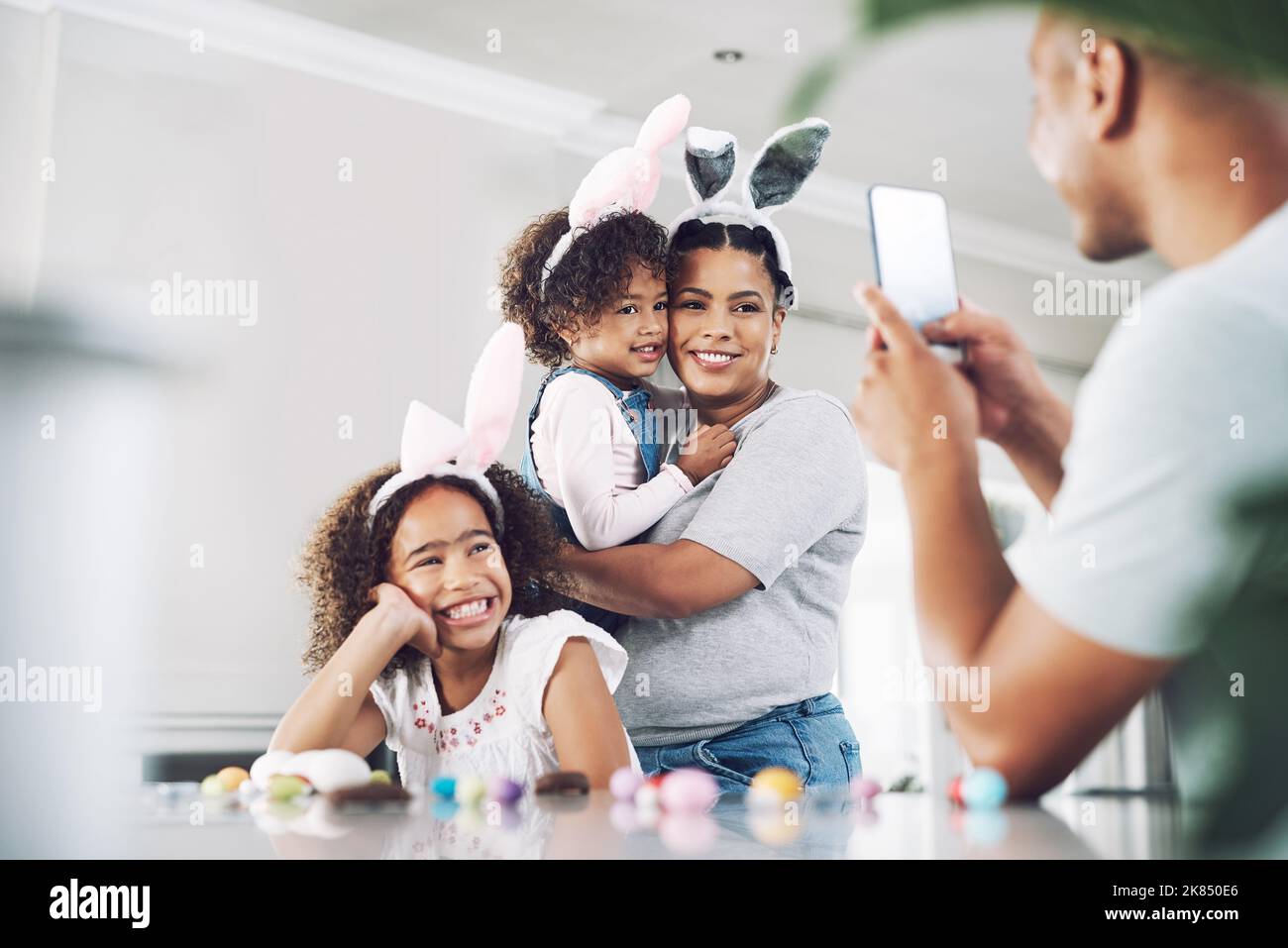 For me, family always comes first. a father taking a photo of his ...