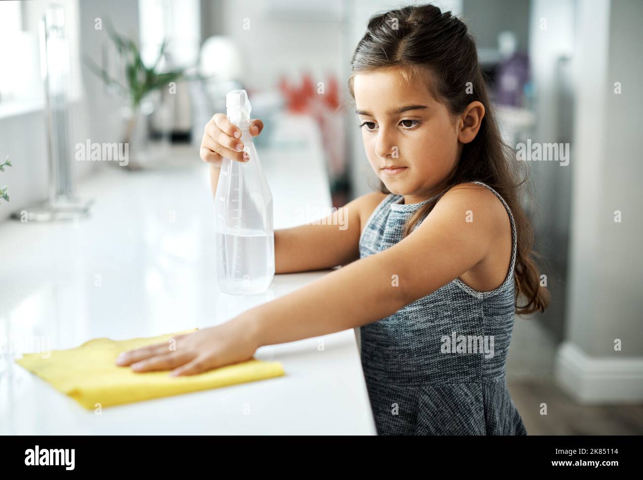 Its almost clean. an adorable little girl helping out with chores at ...