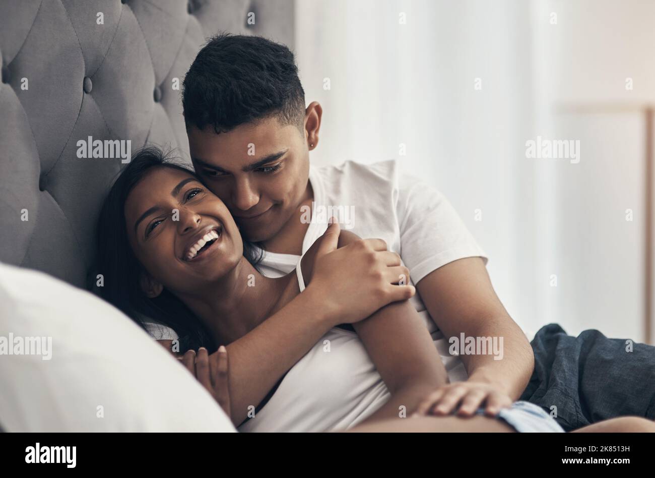 He makes me so happy. a young couple sharing an intimate moment at home ...