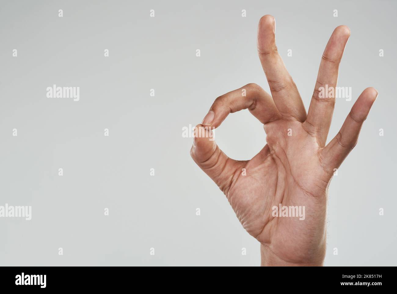 Youre going to be ok. an unrecognizable man showing the ok sign Stock ...
