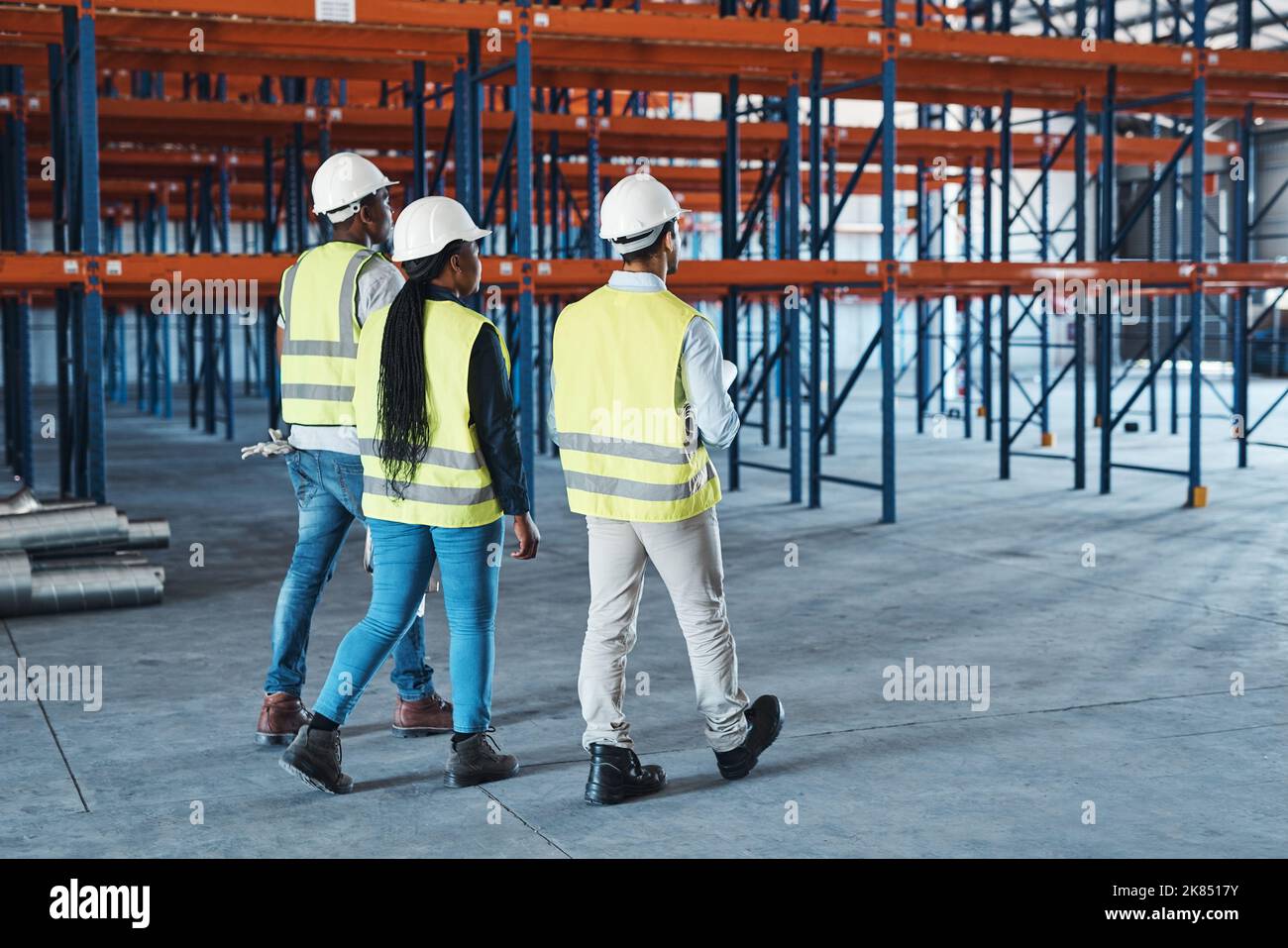 Things work when we do together. a group of contractors walking through ...