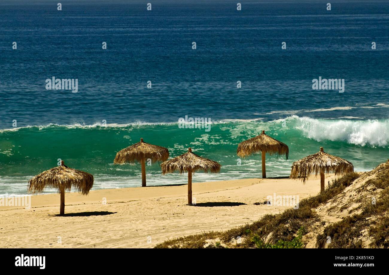 Big waves, palapas on beach near Punta Gorda, Baja California Sur ...