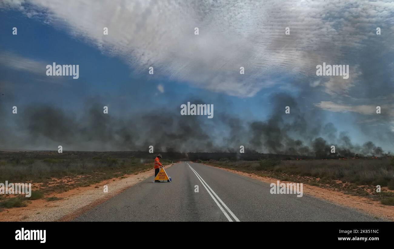 Bushfire on the Road western australia Exmouth Stock Photo - Alamy