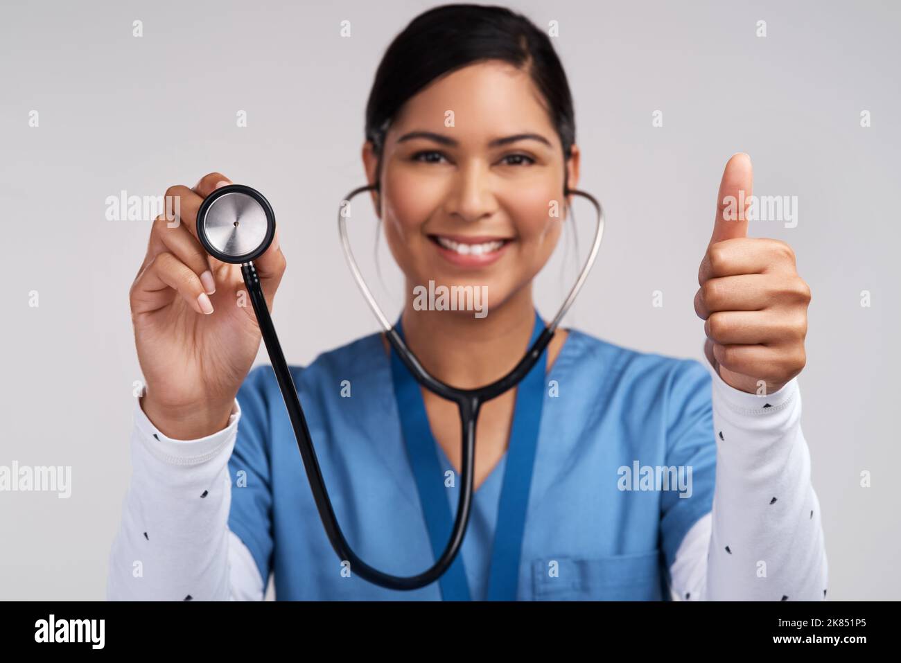 Dr-not just a prefix, a superpower. Portrait of a young doctor showing ...