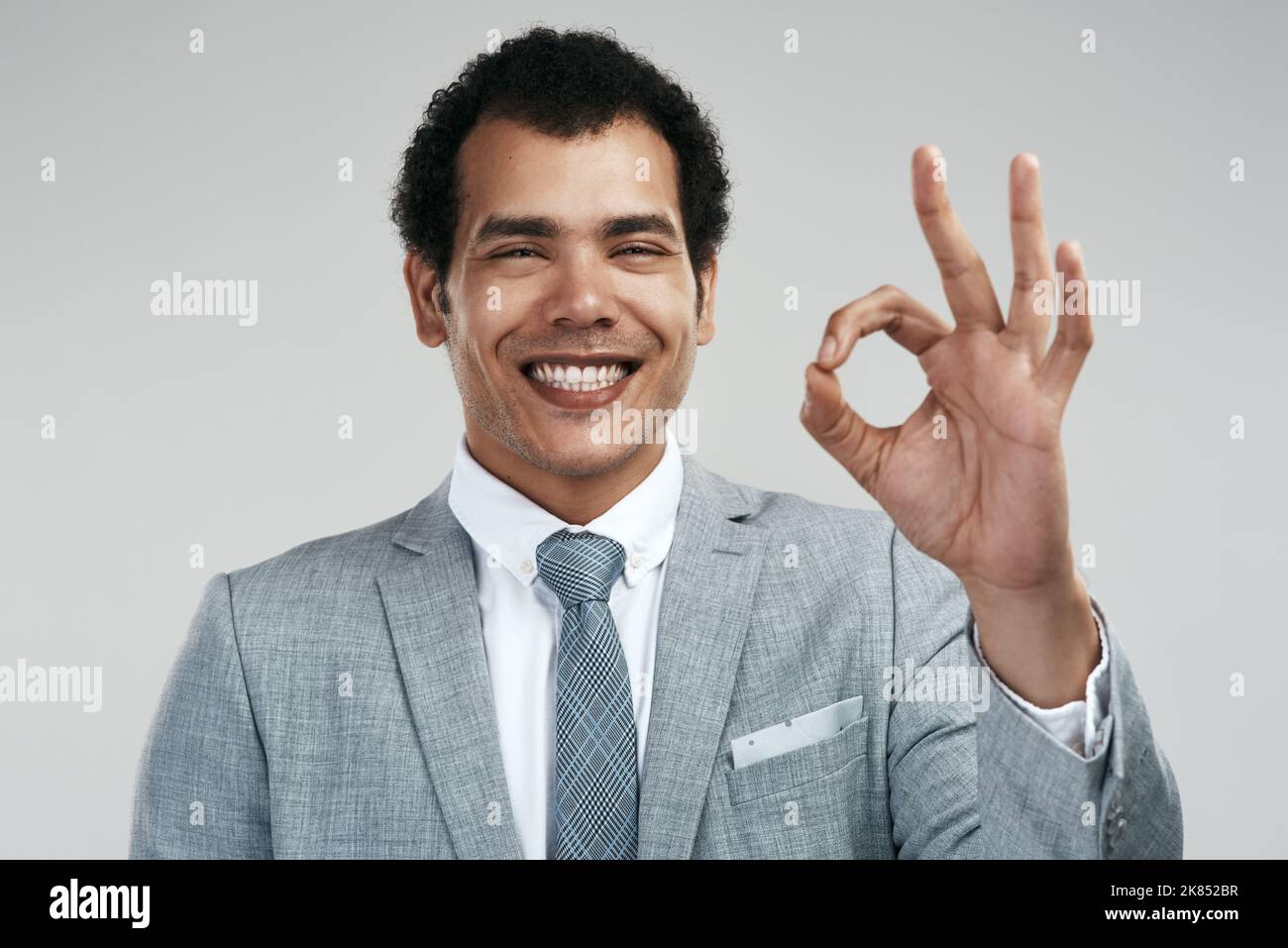 Leave a good first impression. Studio shot of a businessman showing the ...