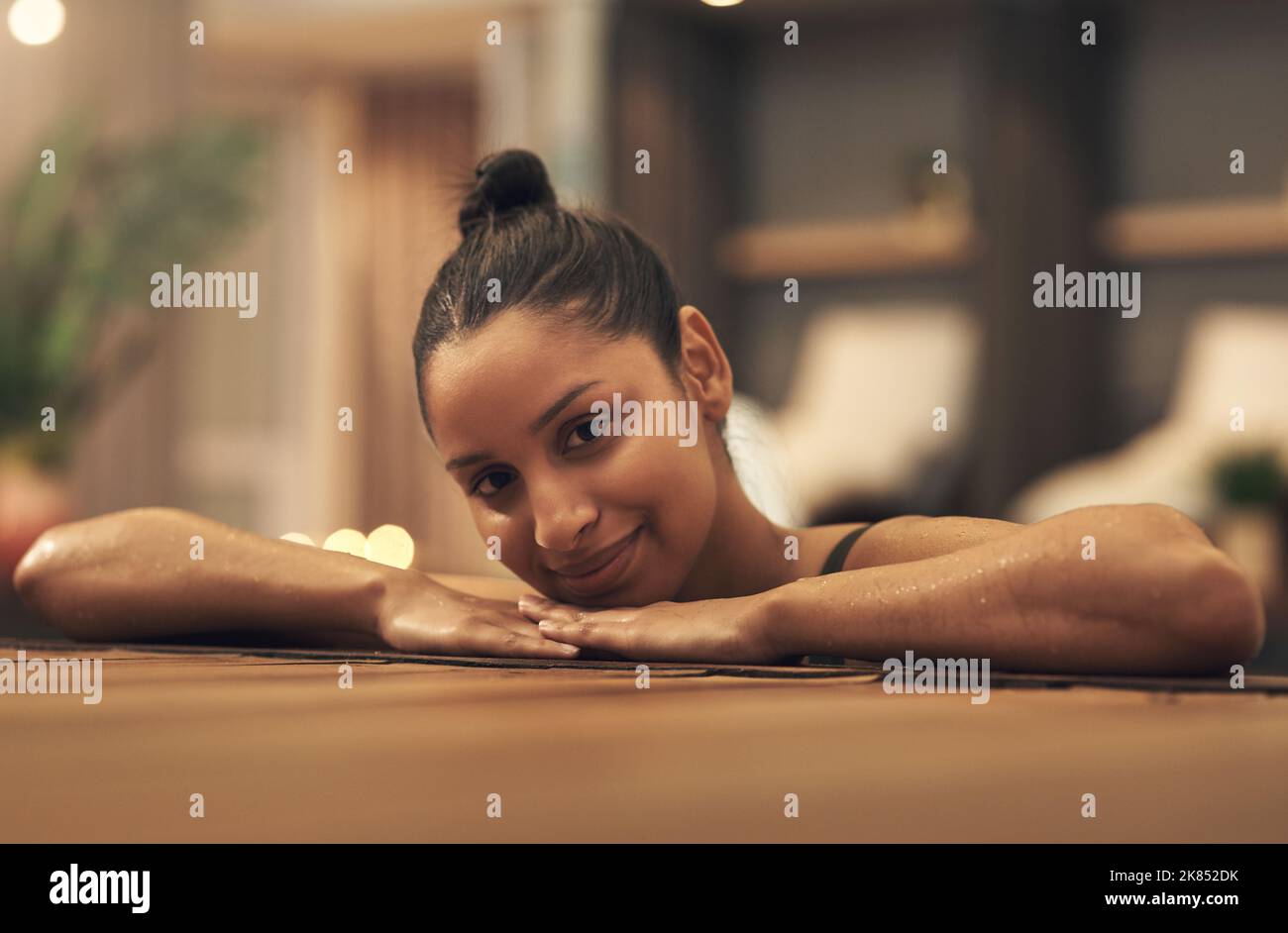 Give yourself a break, you deserve it. a young woman relaxing in a pool ...
