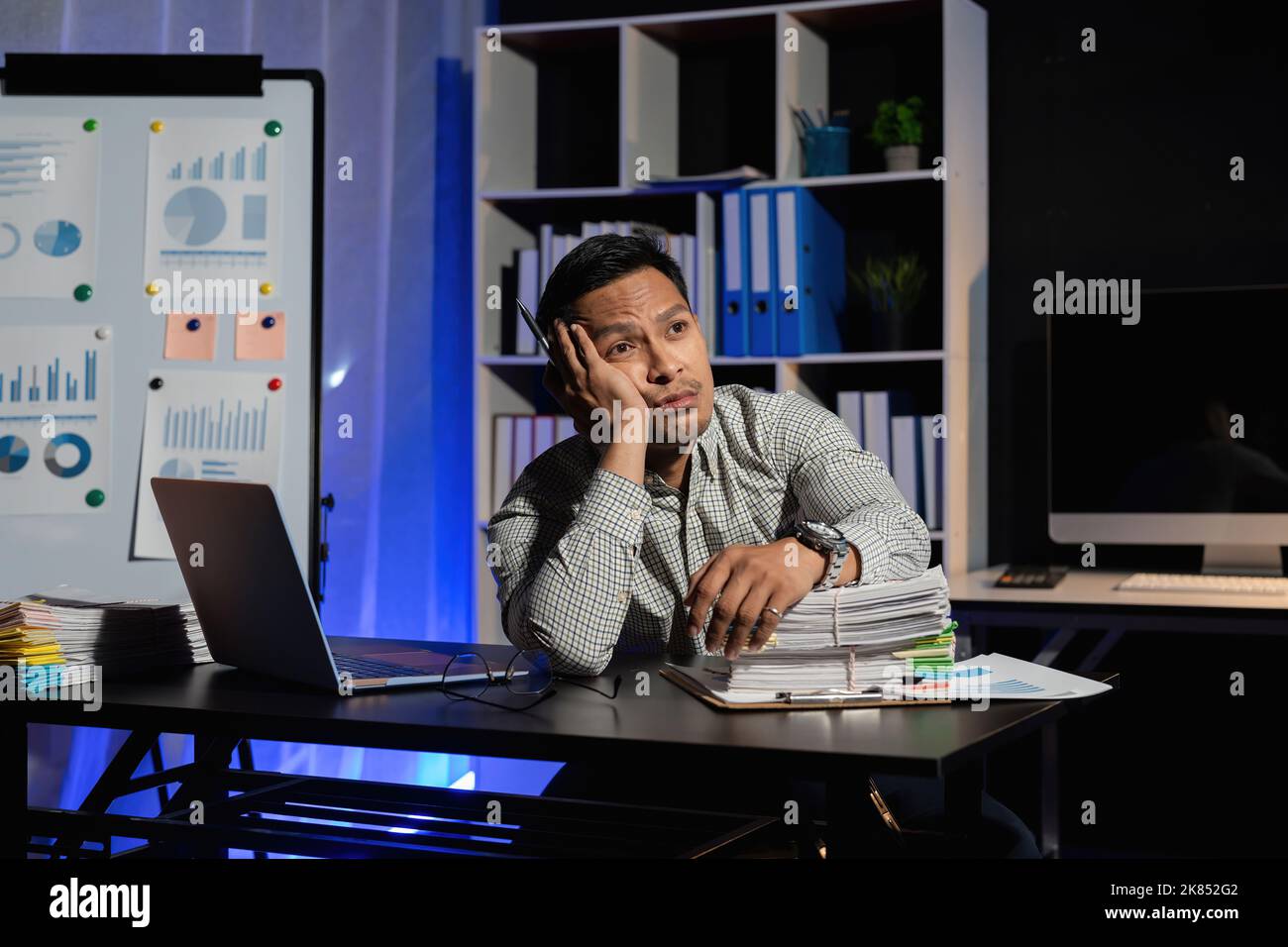Tired, sleeping and burnout for night worker, asian business man or ...