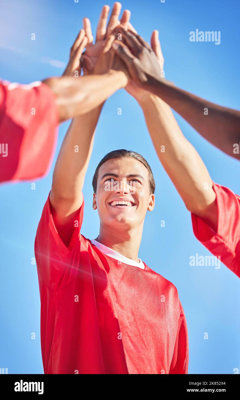 Group happy athletes high five hi-res stock photography and images - Alamy