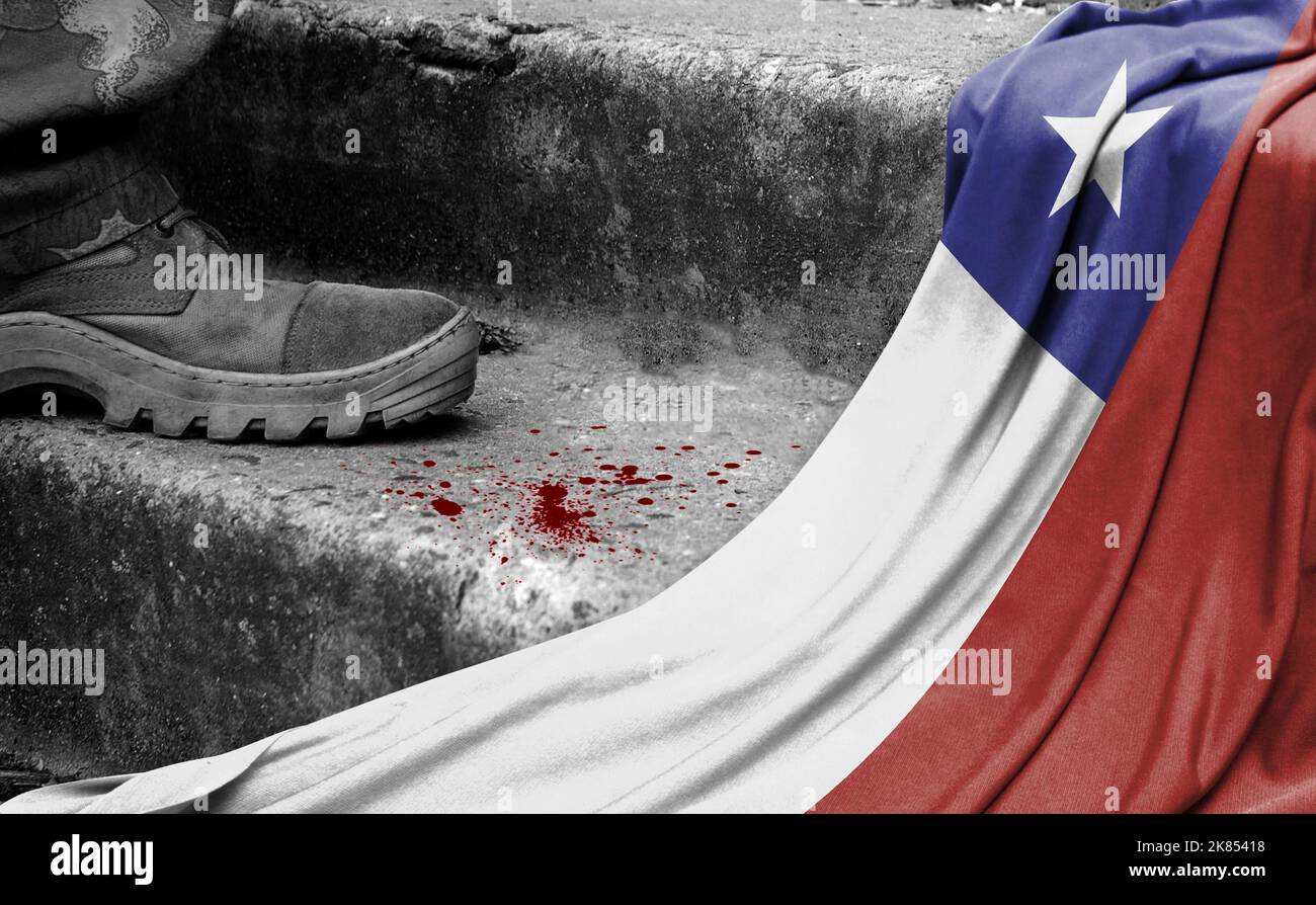 The leg of the military stands on the step next to the flag of Chile ...