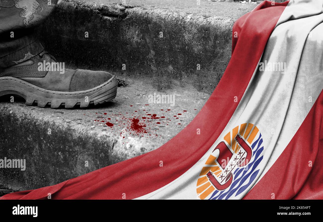 The leg of the military stands on the step next to the flag of French ...