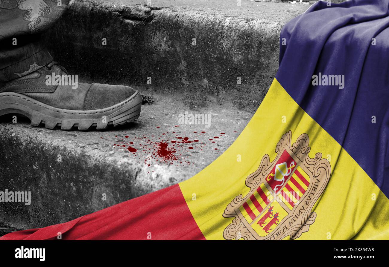 The leg of the military stands on the step next to the flag of Andorra ...