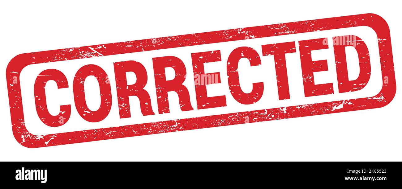 CORRECTED text written on red rectangle stamp sign Stock Photo - Alamy