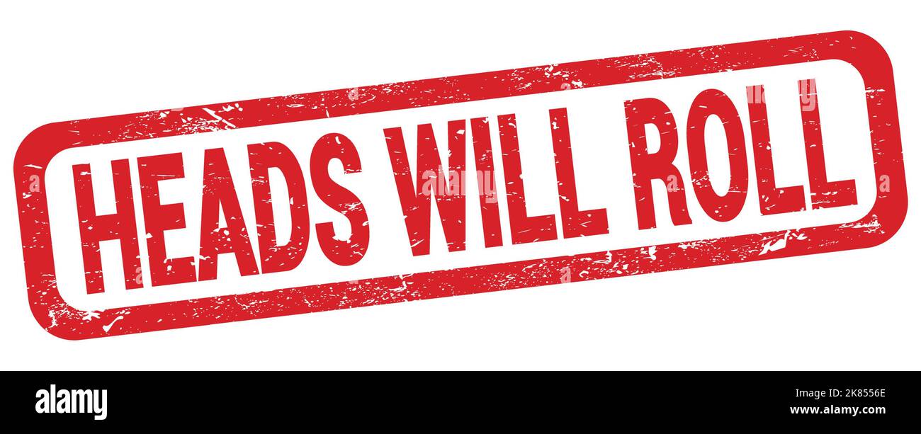 HEADS WILL ROLL text written on red rectangle stamp sign Stock Photo ...