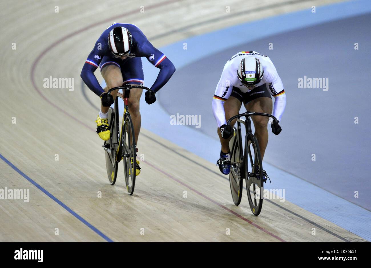 France's Kevin Sireau (left) and Robert Forstemann go head to head ...