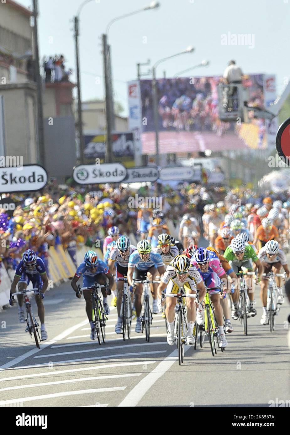 HTC Columbia's Mark Cavendish (R) crosses the finish line in first ...
