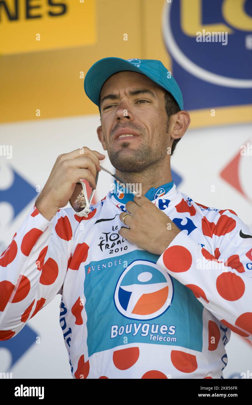 Bouygues Telecom's Anthony Charteau takes the polka dot mountain jersey ...