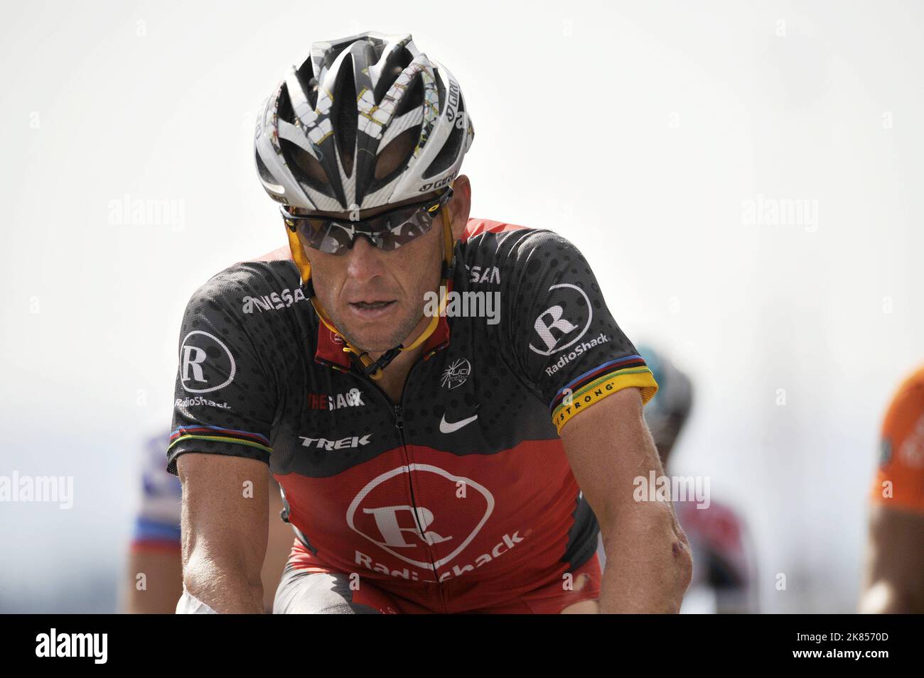 Team RadioShack's Lance Armstrong crosses the finish line in 61st place ...