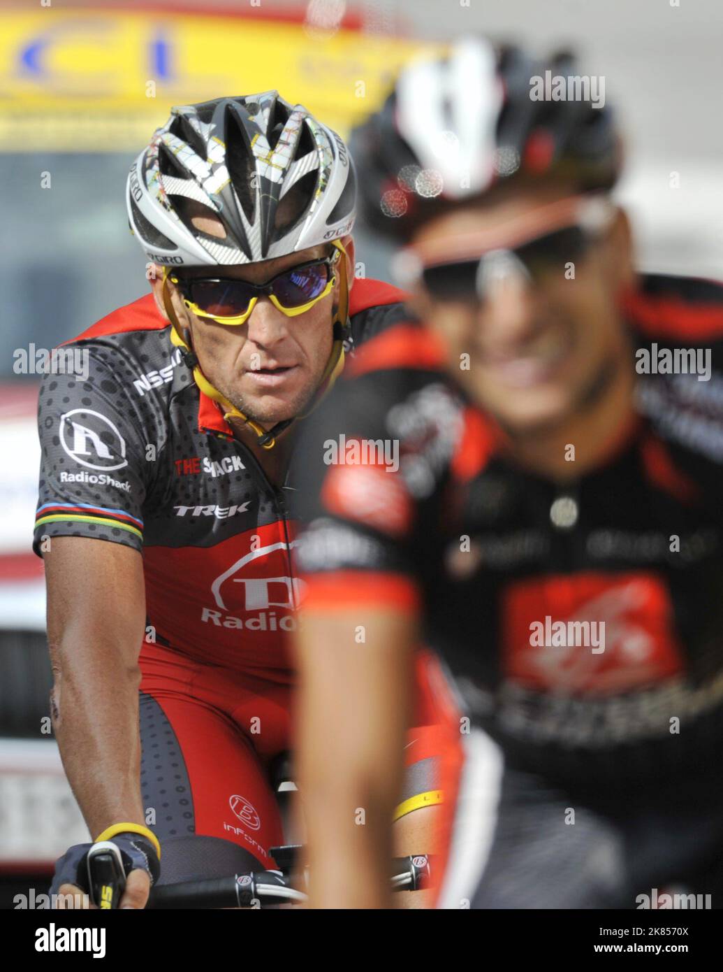 Team Radioshack's Lance Armstrong (L) finishes stage 9 in 18th Stock ...