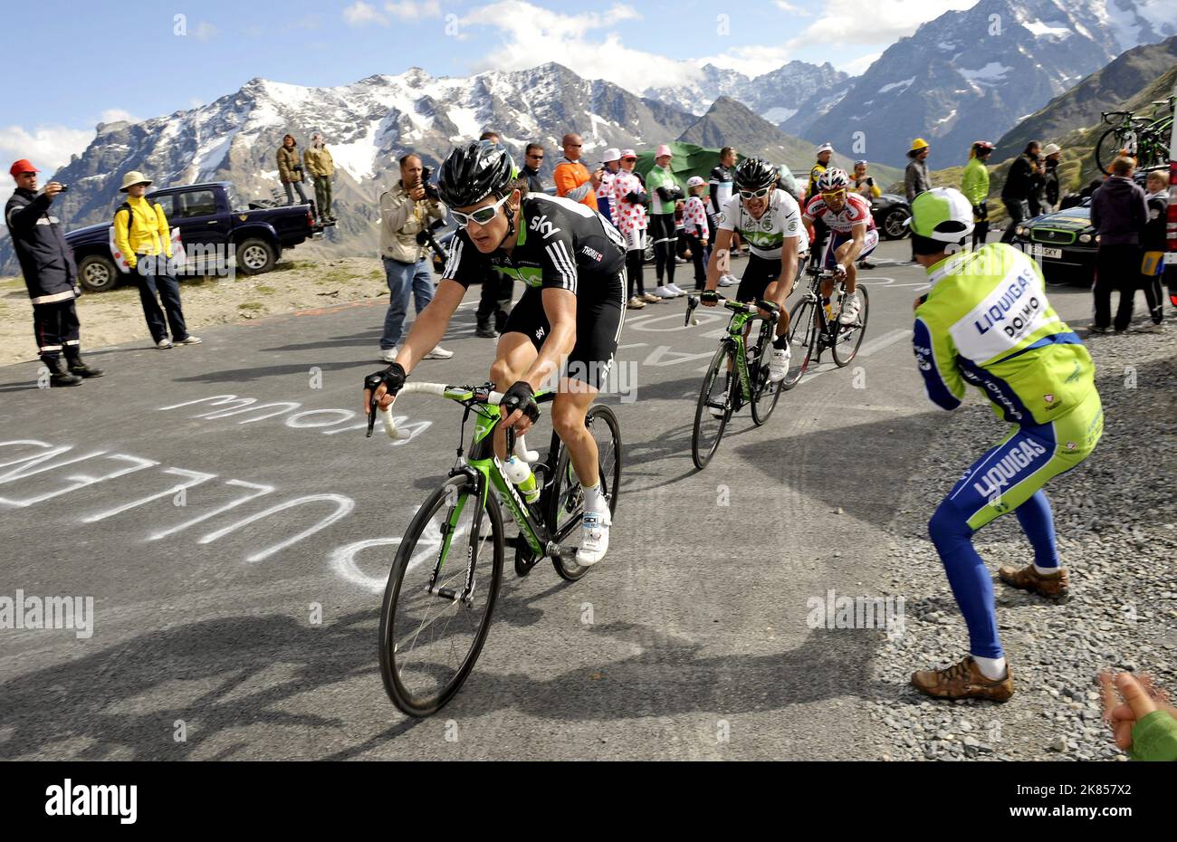 Team Sky's Geraint Thomas rides 2km from the finish line, leading ...
