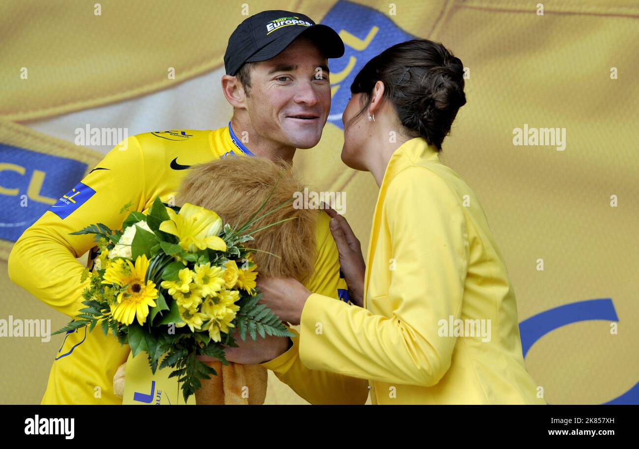 Team Europcar's Thomas Voeckler celebrates after retaining the Yellow ...
